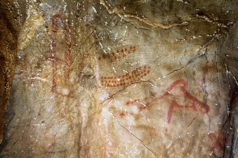 What the mysterious symbols made by early humans can teach us about how ...